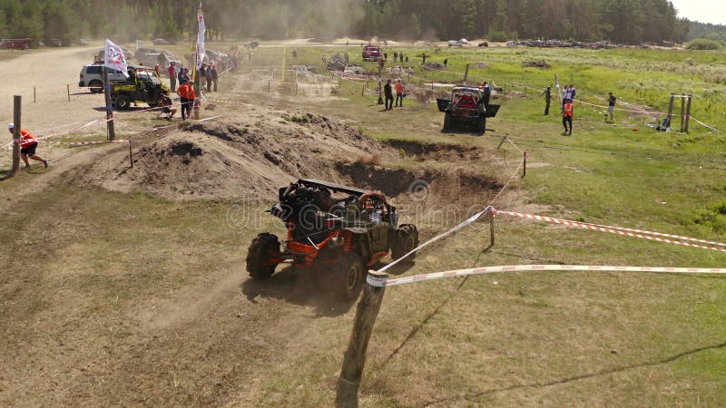 Auto racing in the mud. stock video. Video of helmet - 199042373