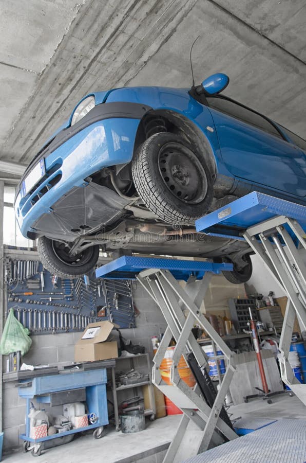 Auto Raised by the Car Lift Stock Photo - Image of body, equipment ...