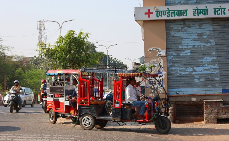 An Auto Rickshaw is a Motorized Version of the Pulled Rickshaw ...