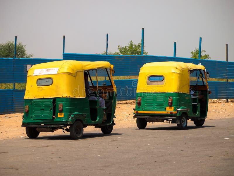 Auto Rickshaw Car Have Green and Yellow Color on New Delhi City, India ...