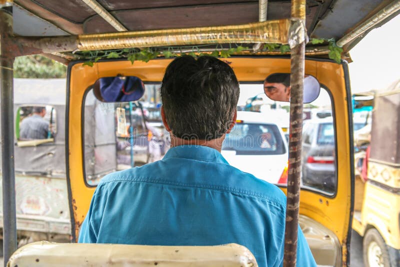An Auto Rikshaw Driver is Stuck into City Traffic Editorial Image ...