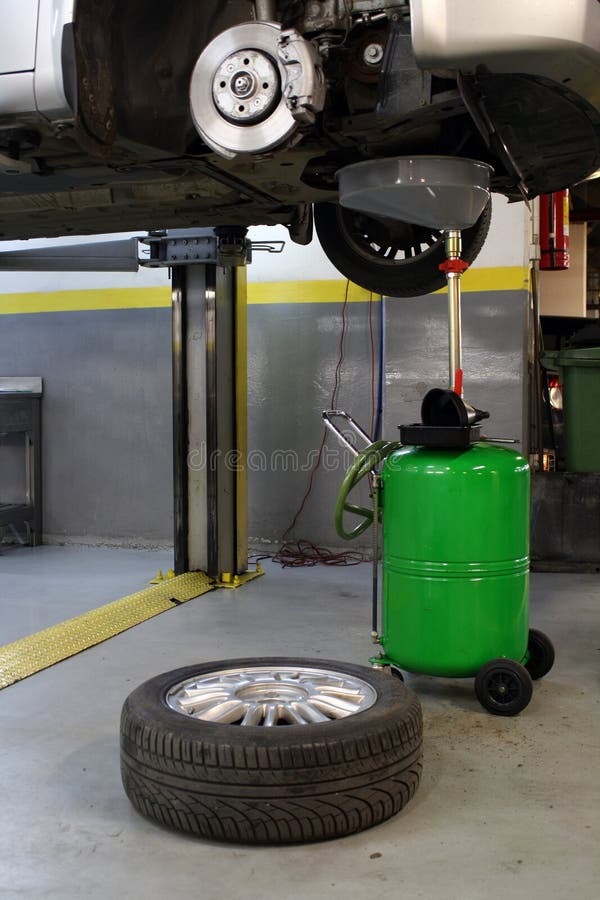Auto service oil changing stock photo. Image of service - 16914260