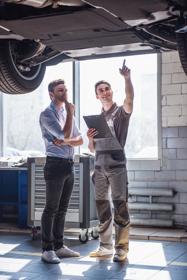 At the auto service stock photo. Image of brake, handsome - 293955456