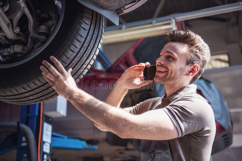 At the auto service stock image. Image of people, mobile - 293955729
