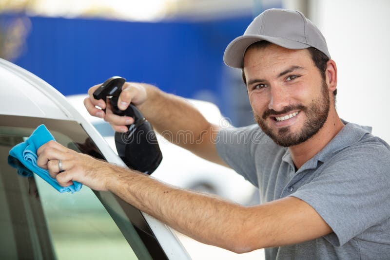 Auto Service Staff Cleaning Car Windshield Stock Image - Image of ...