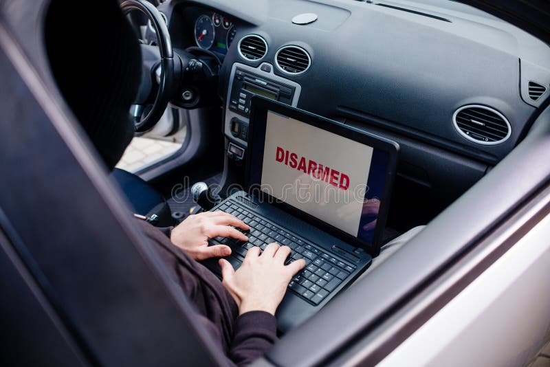Auto Thief Trying To Break Car Security Systems Stock Photo - Image of ...