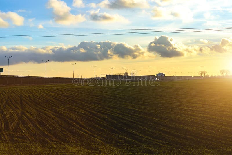 Autobahn Track among the Fields Stock Photo - Image of fence, cars ...