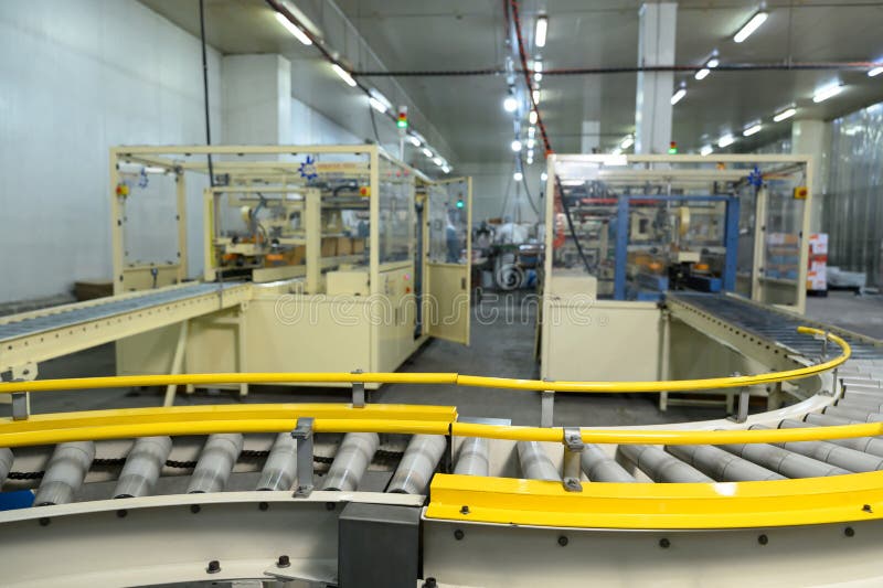 Conveyor System in a Modern Manufacturing Facility Operating Under ...