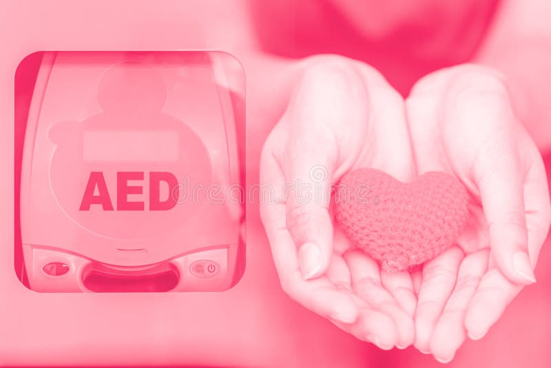 An Automated External Defibrillator AED. Stock Photo - Image of hand ...