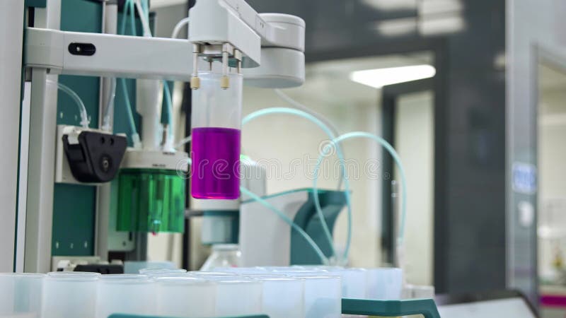 Automated Fluid Research Laboratory. Sample Lifting Machine. Colorful ...