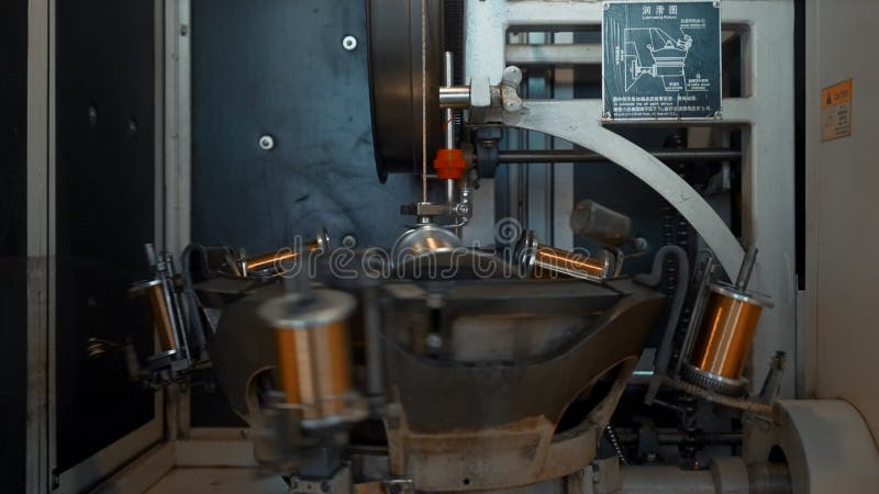 Automated Machine with Rotating Coils and Wire. Creative. Coils Rotate ...