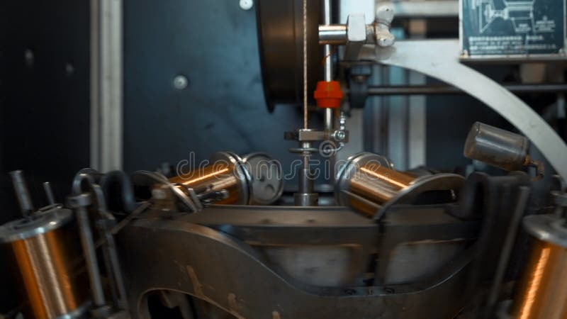 Automated Machine with Rotating Coils and Wire. Creative. Coils Rotate ...
