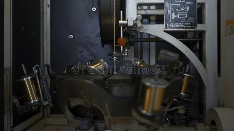 Automated Machine with Rotating Coils and Wire. Creative. Coils Rotate ...