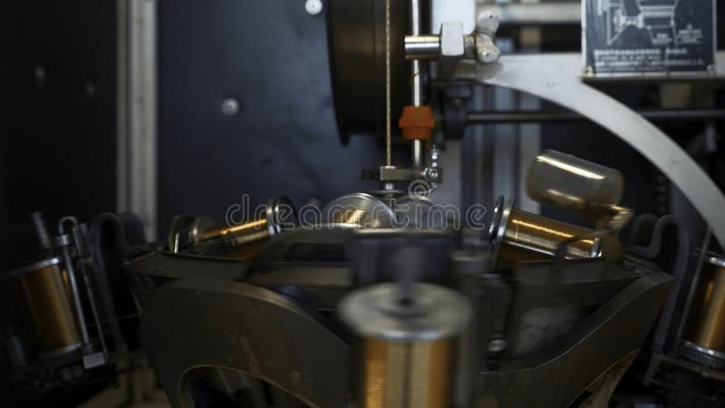 Automated Machine with Rotating Coils and Wire. Creative. Coils Rotate ...