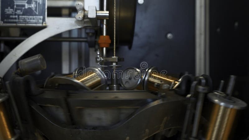 Automated Machine with Rotating Coils and Wire. Creative. Coils Rotate ...