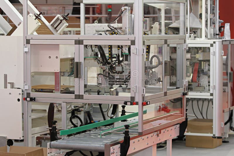 Automated Packing Machine stock photo. Image of factory - 143093662