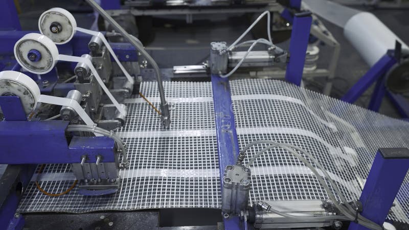Automated Polymer Mesh Machine. Creative. Machines Laying Heating Wires ...