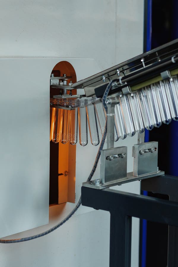 Automated Process of Shaping Plastic Bottles from Preforms Stock Image ...