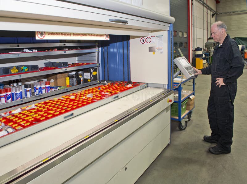 Automated storage cabinet stock image. Image of organized - 39237219