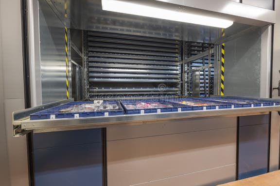Automated Storage System in the Warehouse. Vertical Carousel Storage ...