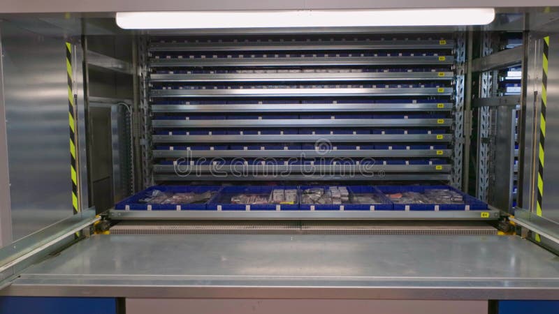 Automated Storage System in the Warehouse. Vertical Carousel Storage ...