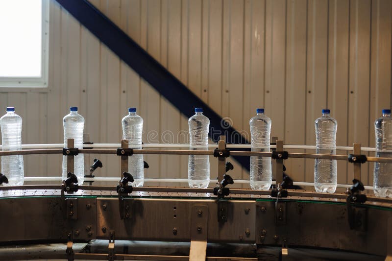 Automated Water Filling Conveyor for Empty Plastic Bottles Stock Photo ...