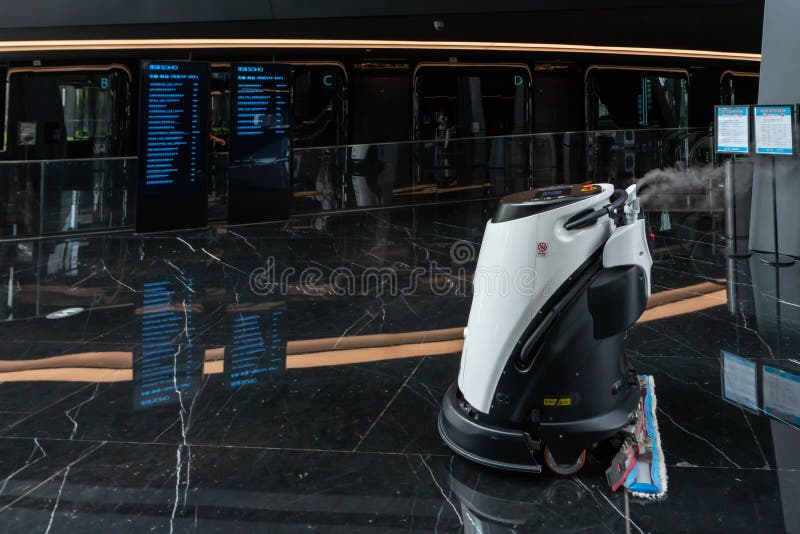 Automatic AI Cleaner Mopping Floor Inside of a Modern Office Building ...