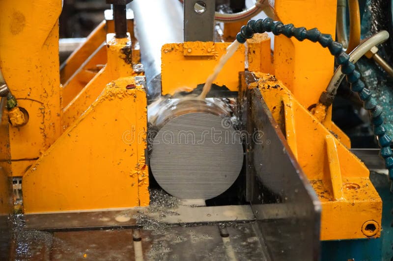 Automatic Band Saw Machine Cutting the Metal Rod with Water Base ...