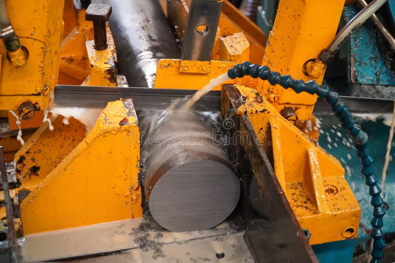 Automatic Band Saw Machine Cutting the Metal Rod with Water Base ...