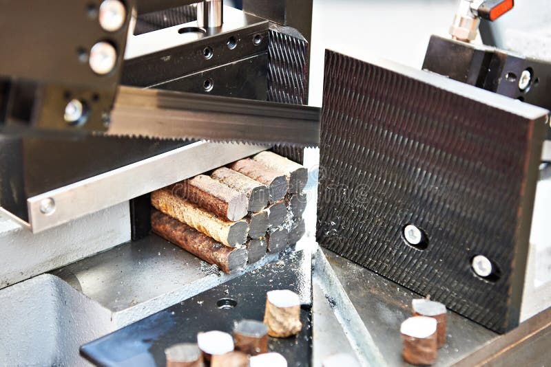 The Automatic Band Saw Machine Cutting the Group of Square Tubes with ...