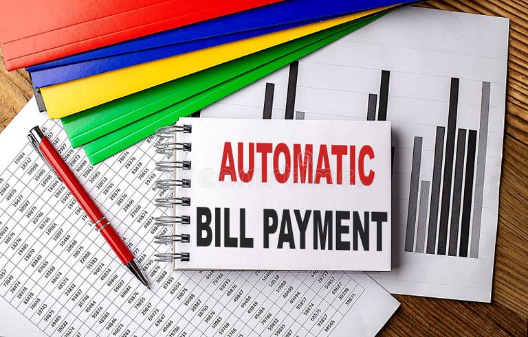 AUTOMATIC BILL PAYMENT Text on Notebook with Folder on Chart Stock ...