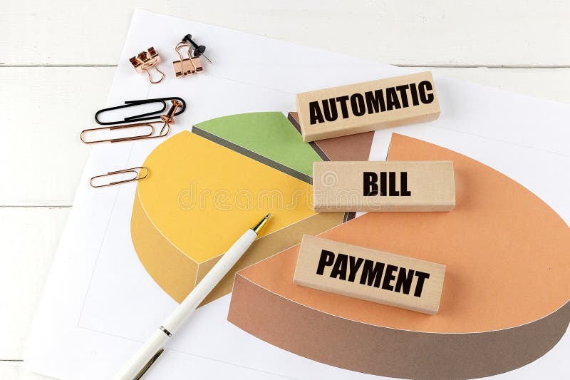 Automatic Bill Payment Text on Wooden Blocks with Pie Chart, Pen, and ...