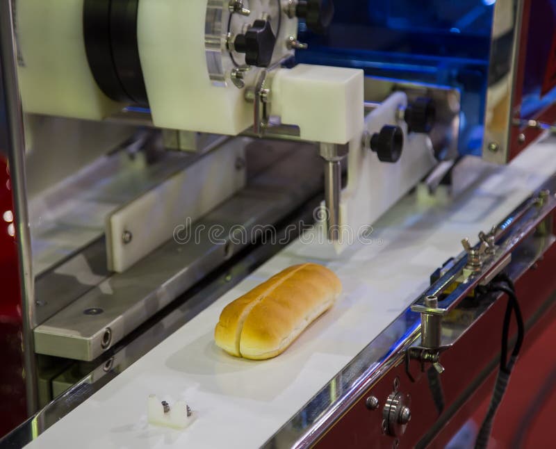 Automatic Bread/Toast/Bun Making Machine Stock Image - Image of ...