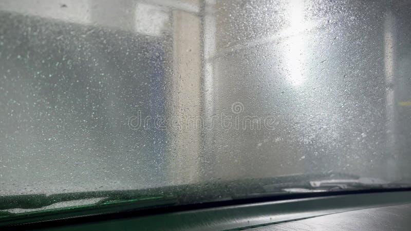 Automatic Car Wash View from the Car Cabin. Sliding Foam from the ...