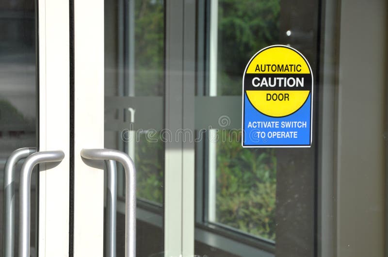Automatic Caution Door Sign Stock Image - Image of flora, space: 25923975