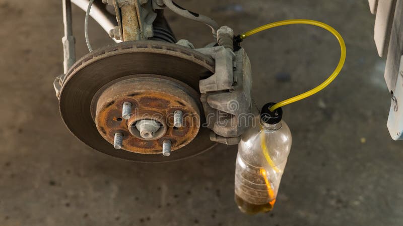 Automatic Change of Brake Fluid in a Car Service. Stock Image - Image ...