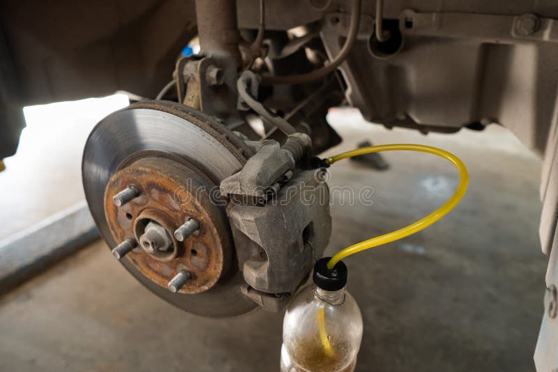 Automatic Change of Brake Fluid in a Car Service. Stock Photo - Image ...