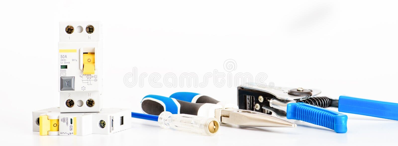 .Automatic Circuit Breakers, Cable and Digital Multimeter on a White ...