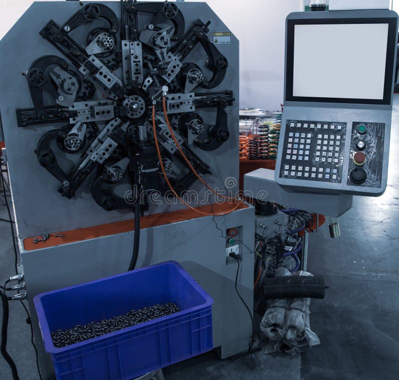 Spring coiling machine editorial image. Image of cord - 198132400