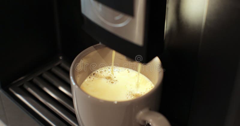Automatic Coffee Machine Filling a Cup with Coffee. Beverage Drink for ...