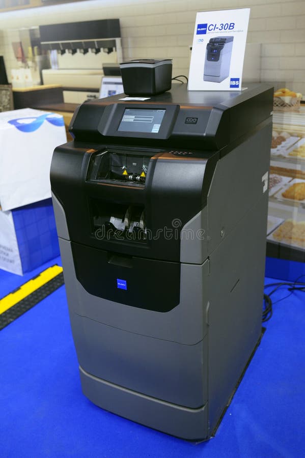 Automatic Deposit Machine Made by Glory Placed on a Stand. Editorial ...