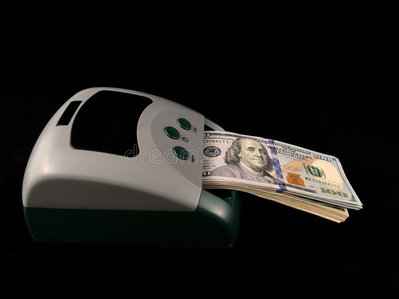 Automatic Detector for Checking Banknotes. Dollars are Checked through ...