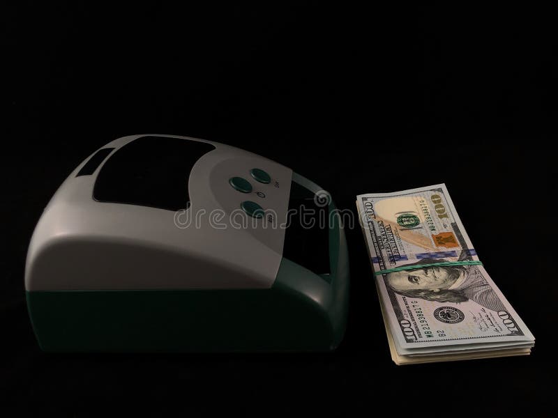 Automatic Detector for Checking Banknotes. Dollars are Checked through ...