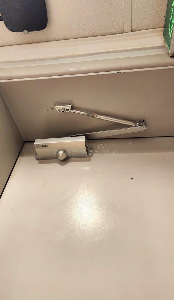 Automatic Door Closer Made of Silver Iron Stock Photo - Image of room ...