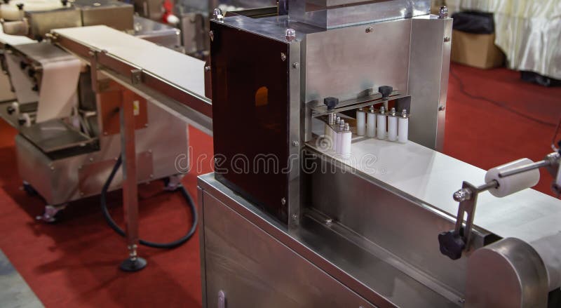 Automatic Encrusting and Moulding Machine Stock Photo - Image of ...