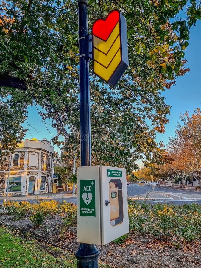Automatic External Defibrillator Hanging on a Pole in a Public Park for ...