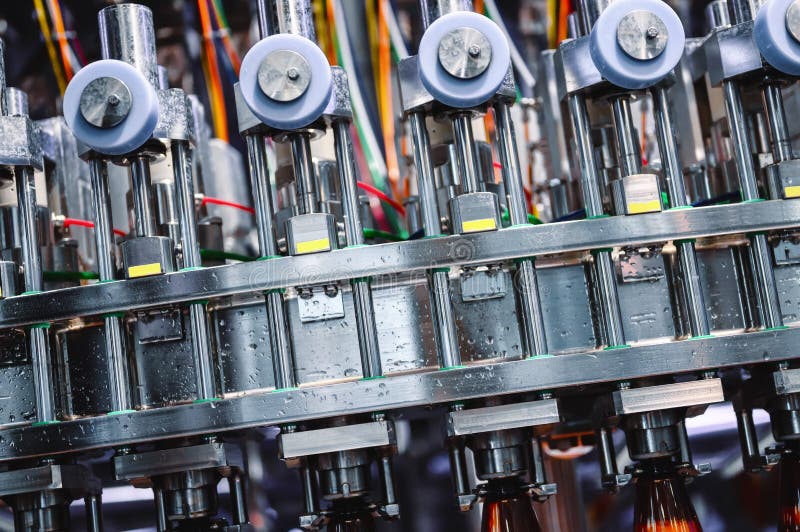 Automatic Filling Machine, the Process of Filling Plastic Bottles with ...