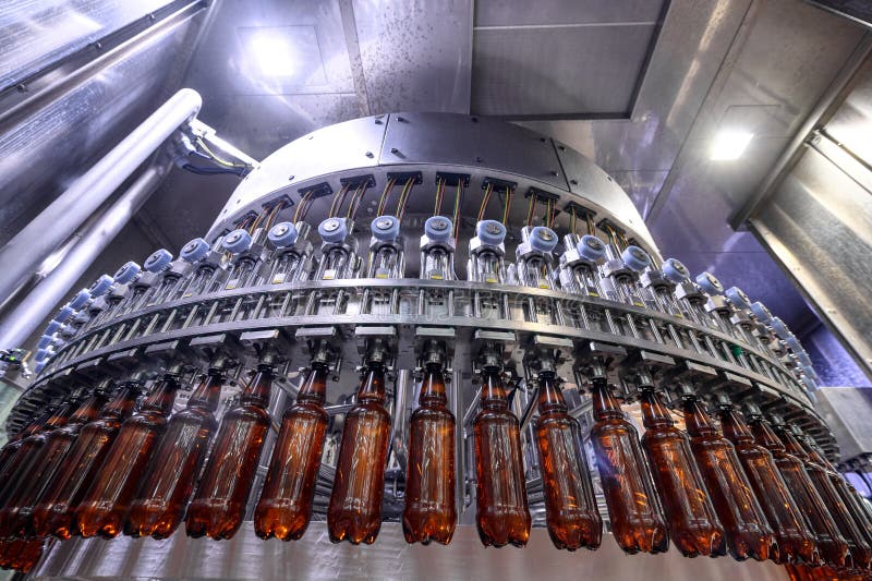 Automatic Filling Machine, the Process of Filling Plastic Bottles with ...