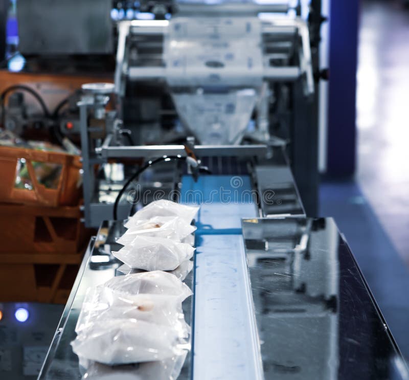 Automatic Flow Wrapping Machine Stock Image - Image of bakery, baker ...