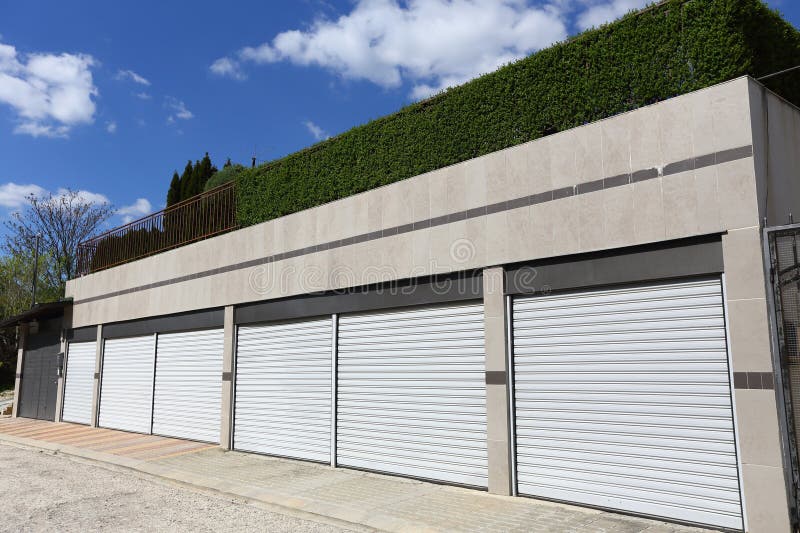 Automatic garage doors stock image. Image of property - 332057081